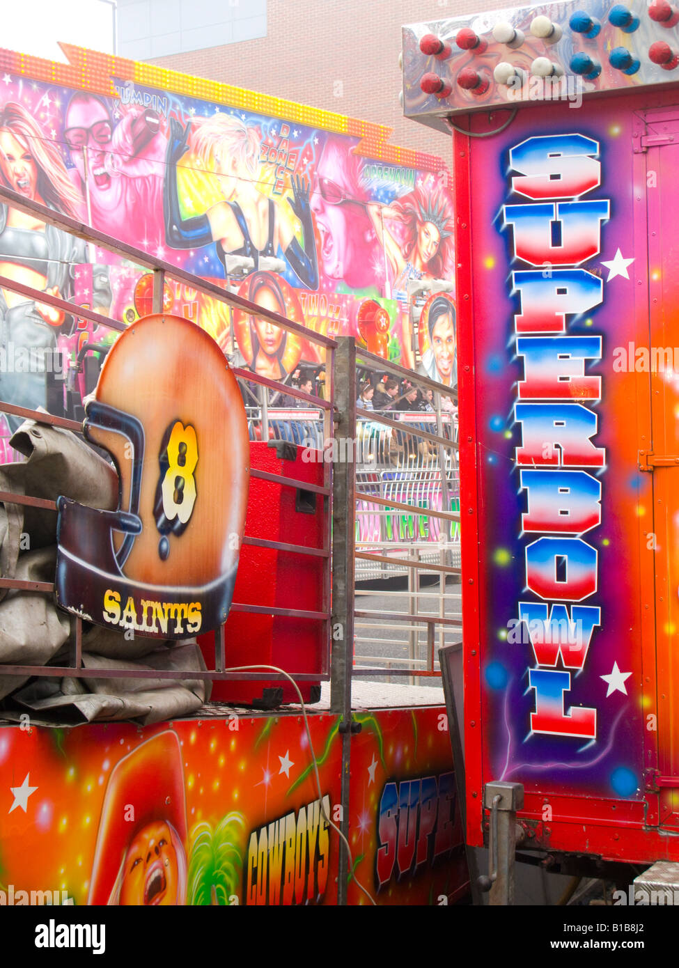 Colorful fairground ride showing bold fun colors Stock Photo - Alamy