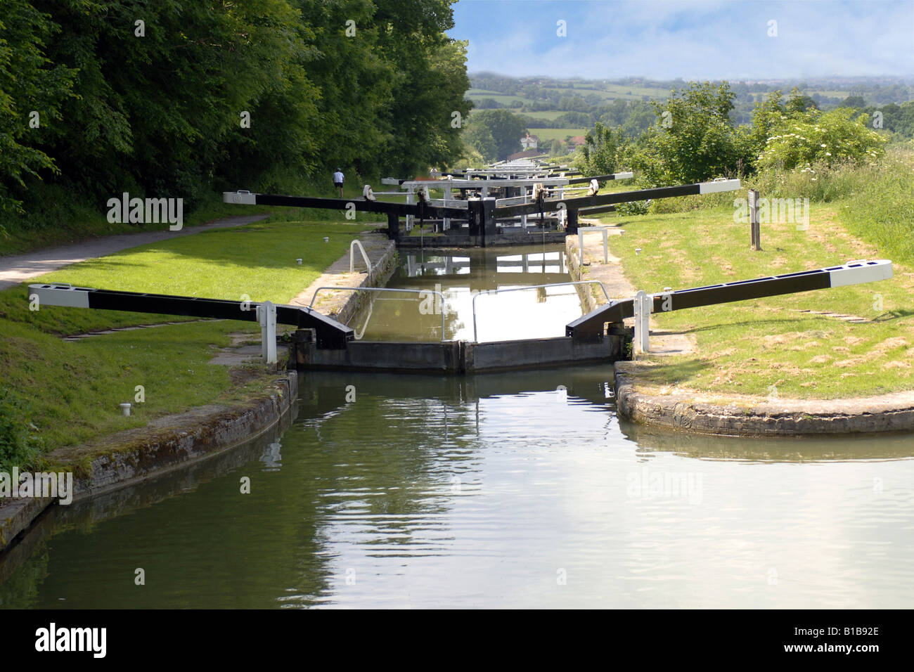 A flight of locks rising 230ft over Caen Hill at Devizes in Wiltshire ...