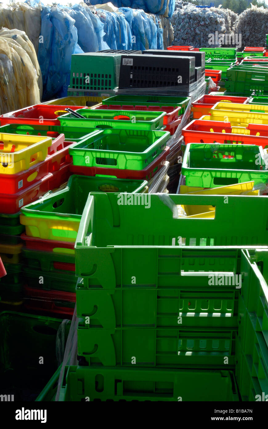 Stacks of plastic supermarket trays awaiting recycling Stock Photo - Alamy