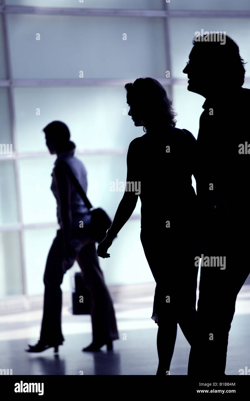 Silhouettes of people in a hurry Stock Photo - Alamy