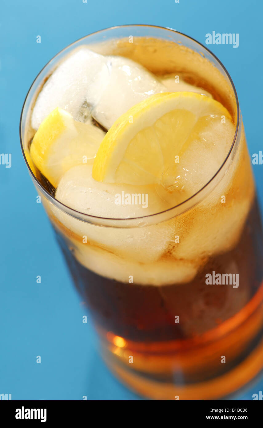 Glass of cold lemon iced tea with water drops on surface Stock Photo ...