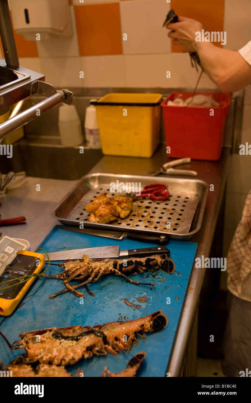 Food being prepared in the kitchens of the Maison Pic restaurant in ...