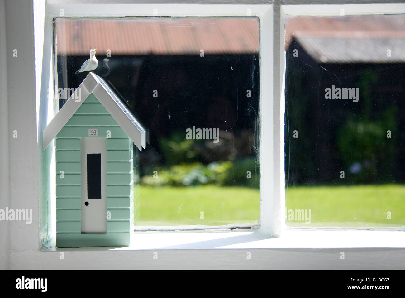 seagull beach hut Stock Photo - Alamy
