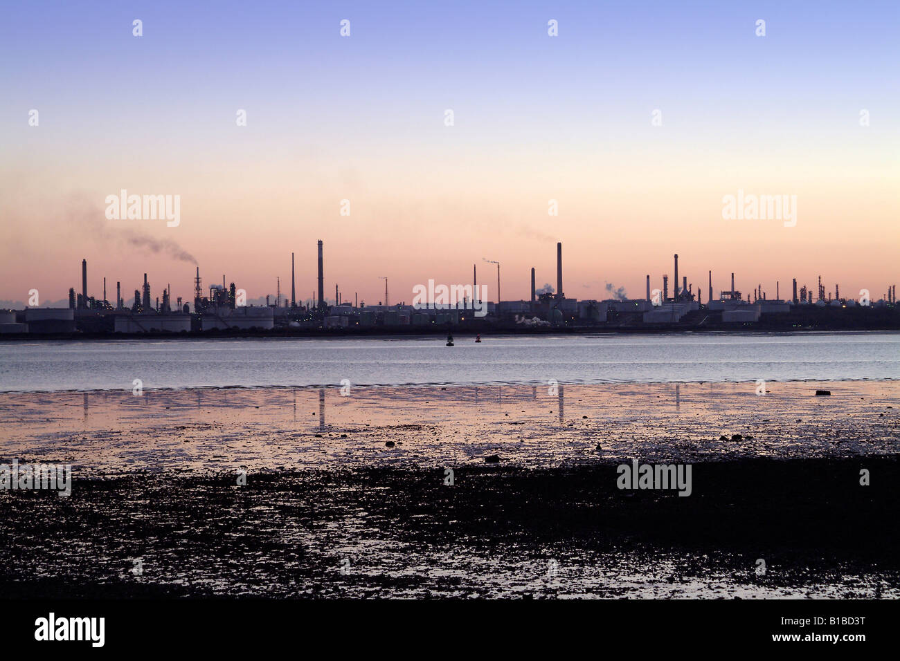 Fawley oil refinery on Southampton Water, Hampshire, England at dusk ...