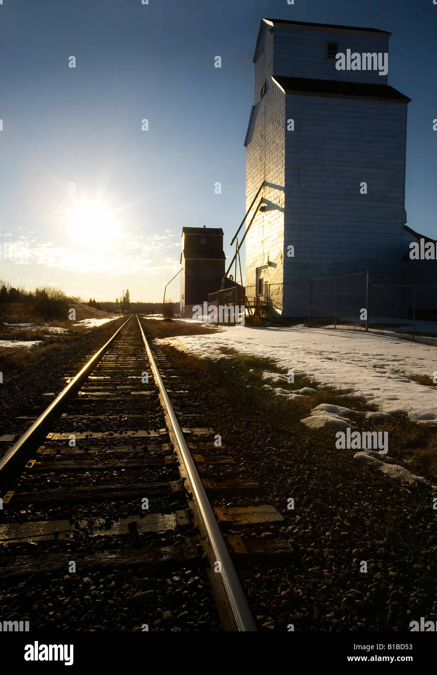 Grain elevator with railroad tracks Stock Photo - Alamy