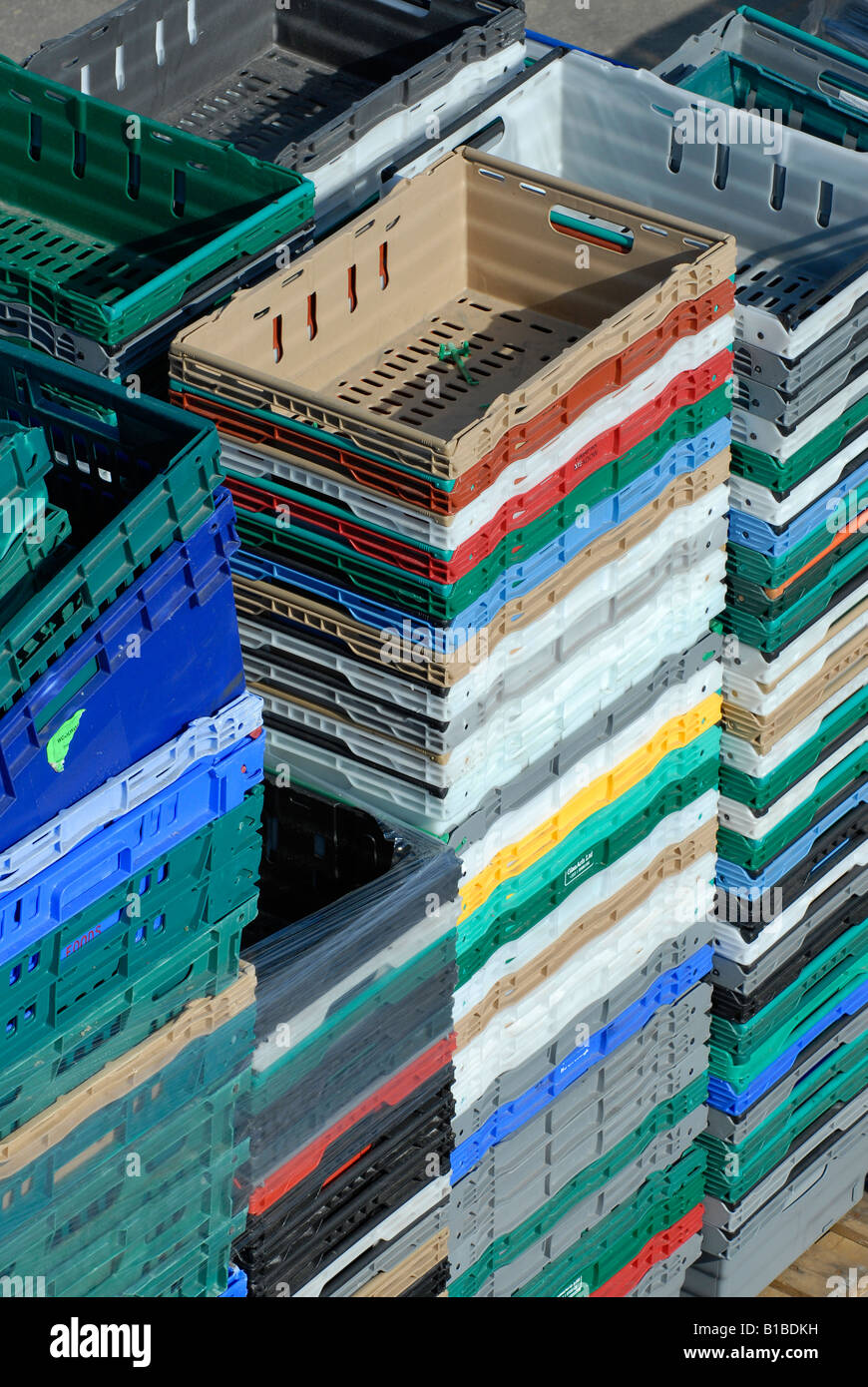 Stacks of plastic supermarket trays awaiting recycling Stock Photo - Alamy