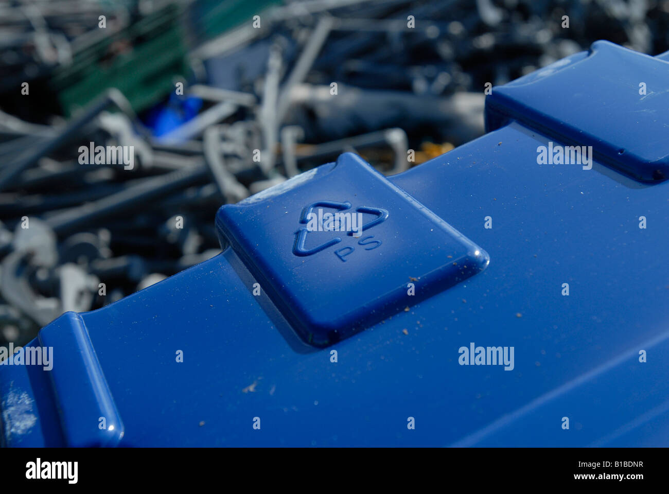 Recycling logo on plastic container Stock Photo - Alamy