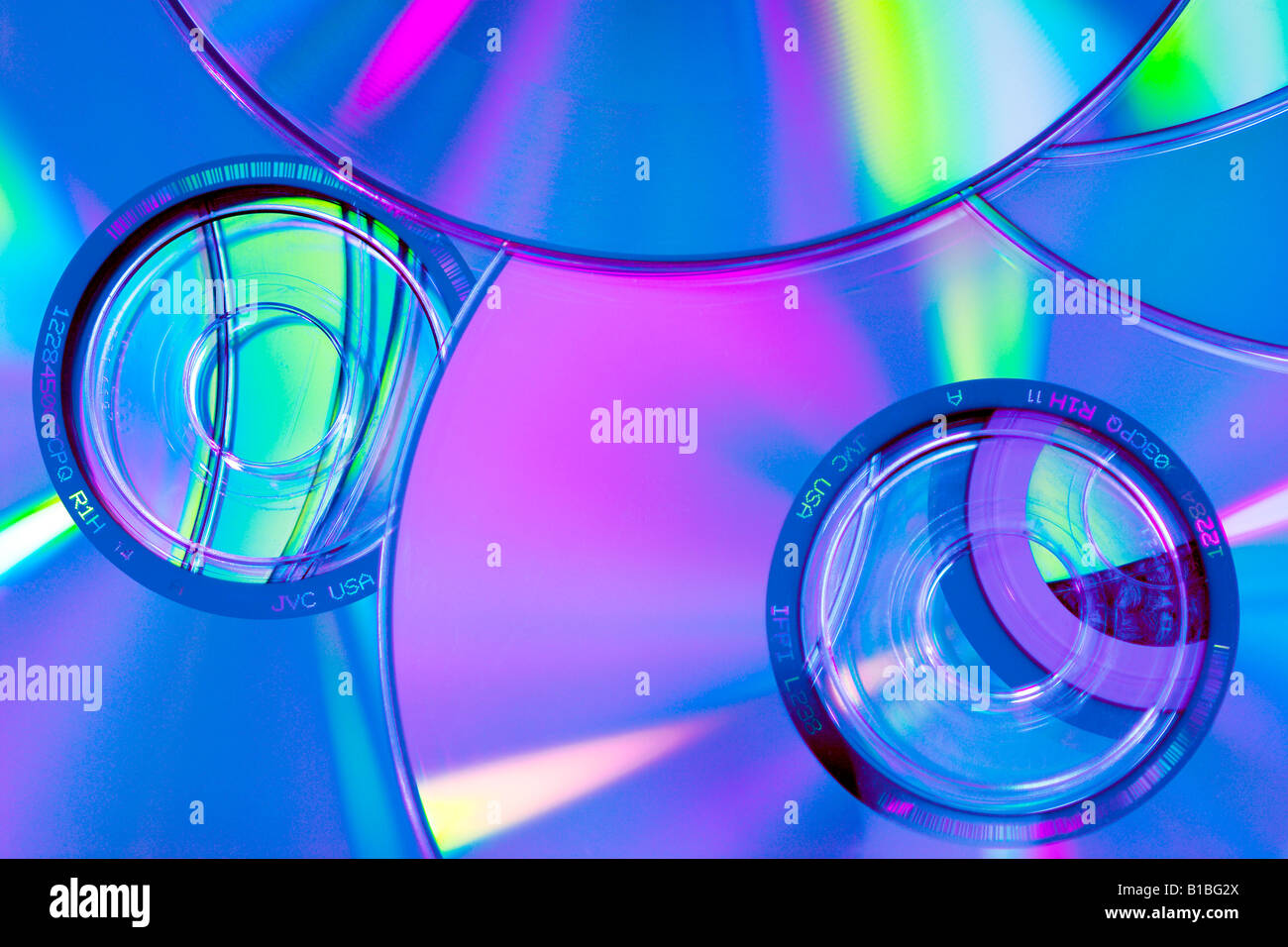 CD Rom data disks reflecting multi-colored light Stock Photo - Alamy