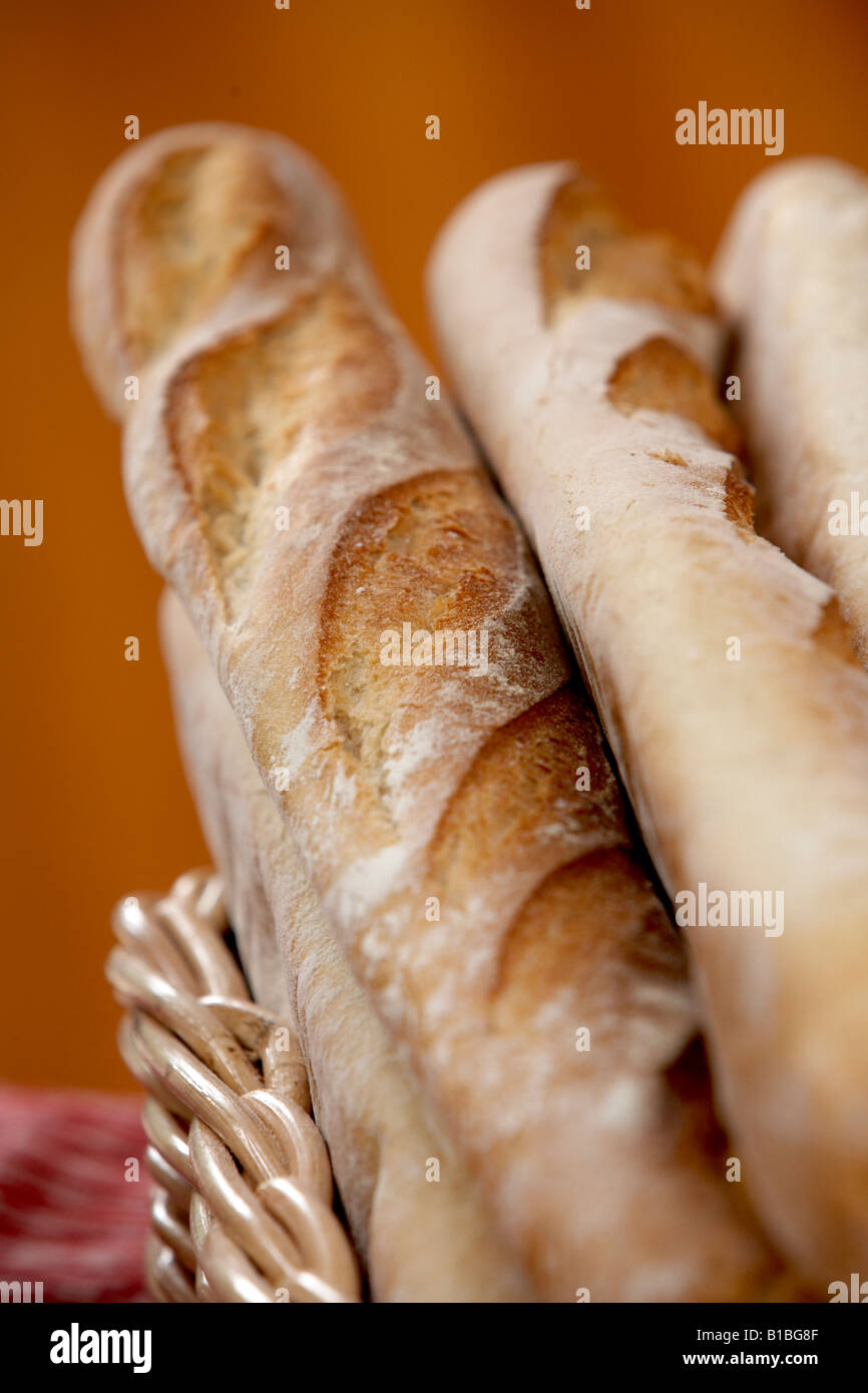 rows of freshly cooked french stick in row Stock Photo - Alamy