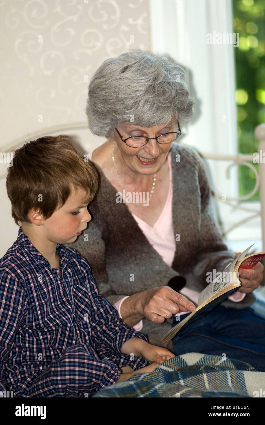 Grandmother reading her grandson a bedtime story Stock Photo - Alamy