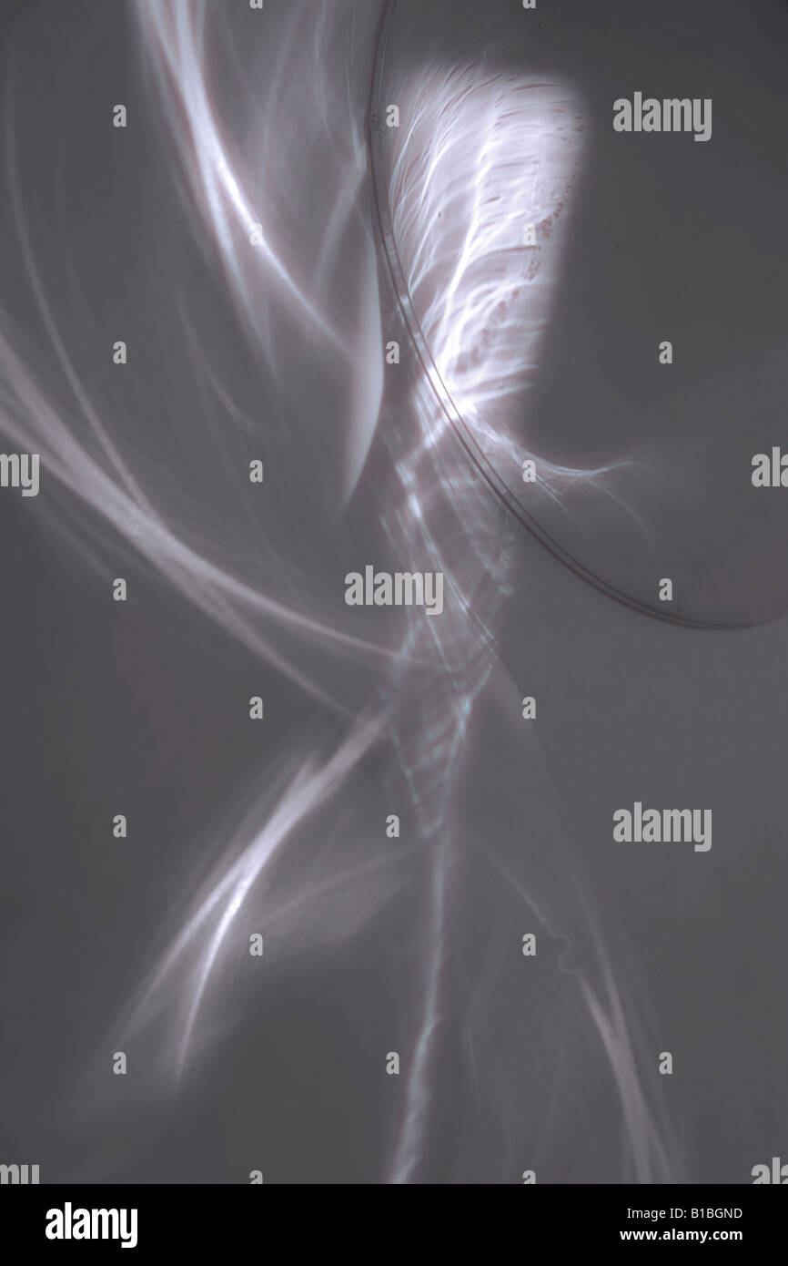 light filtered through glass onto a textured surface Stock Photo - Alamy