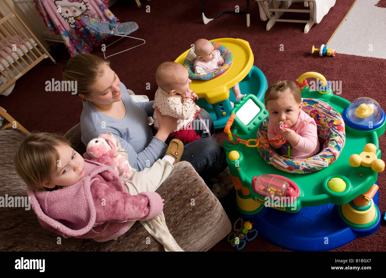 Childcare Worker With Children Stock Photos & Childcare Worker With ...