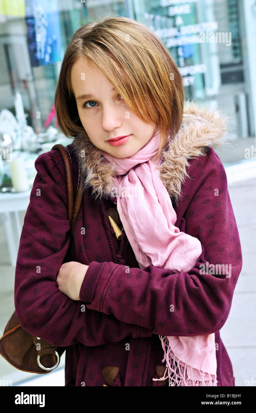 Teenage girl shivering in cold weather outside Stock Photo - Alamy