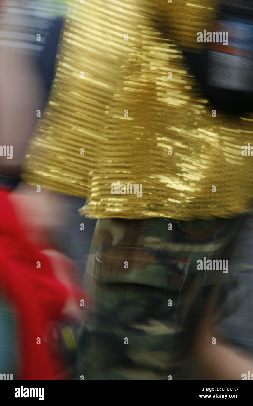 man wearing golden jacket in town Stock Photo - Alamy