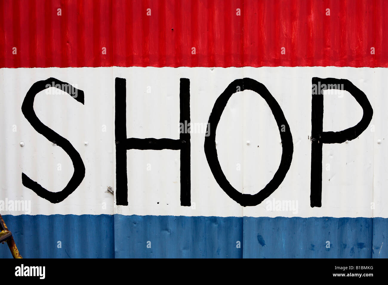 dutch orchard shop sign painted on painted corrogated dutch flag door ...