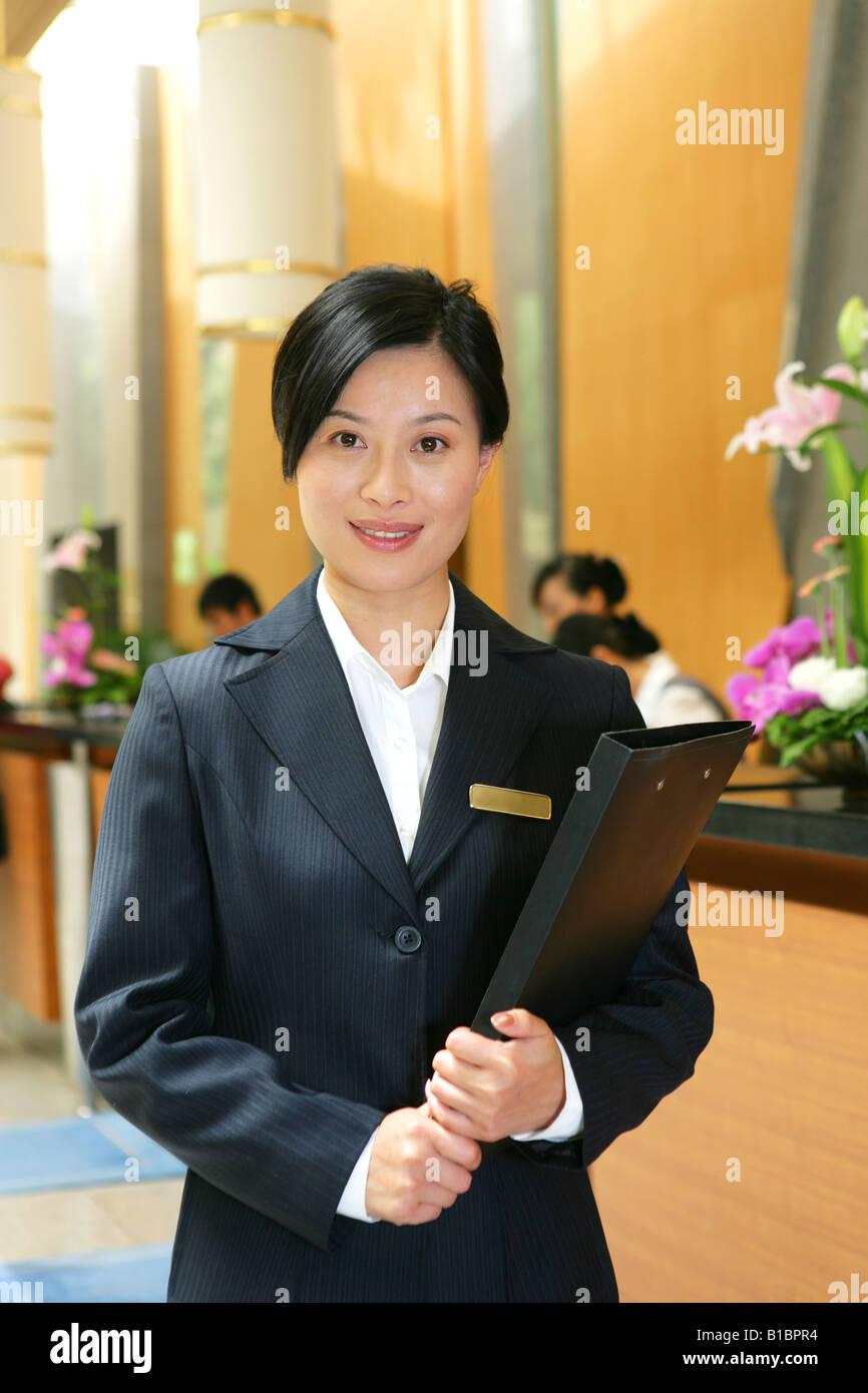 portrait of hotel manager Stock Photo - Alamy
