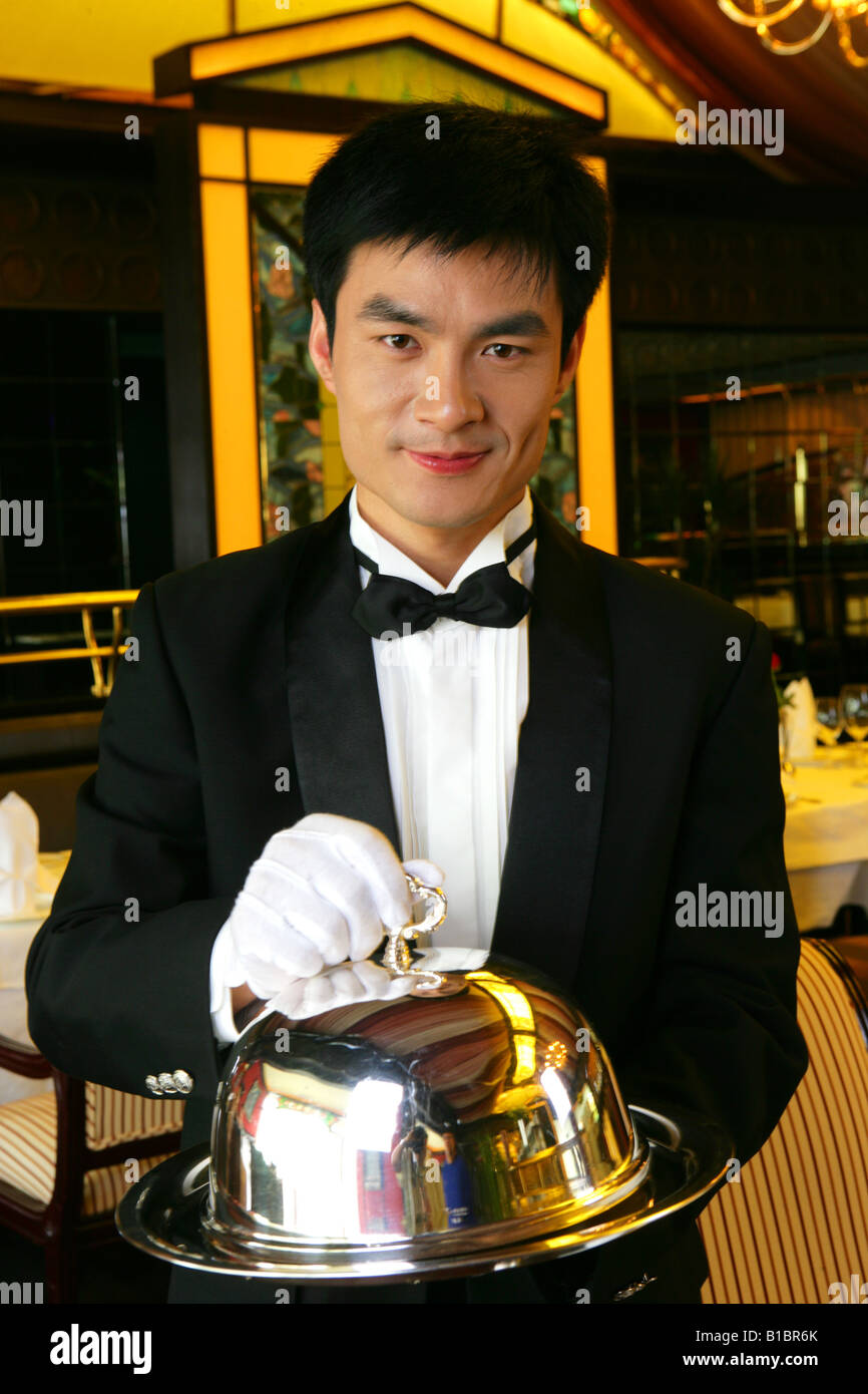 Portrait chinese man serving hi-res stock photography and images - Alamy