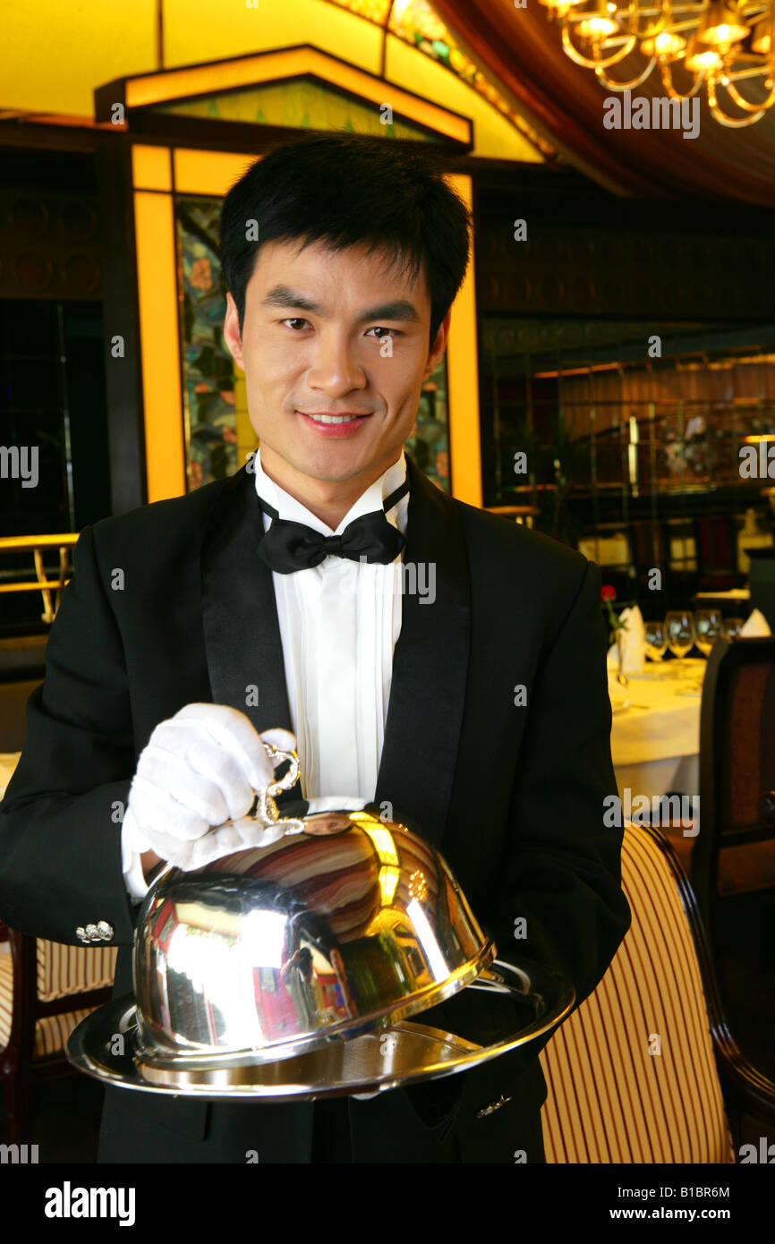 Chinese waiter hi-res stock photography and images - Alamy