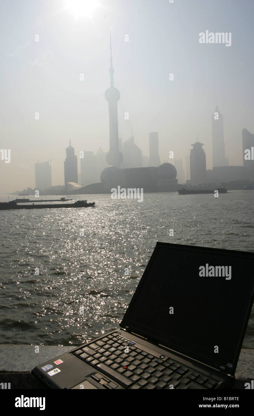 laptop with Huangpu River and Pudong as background Stock Photo - Alamy