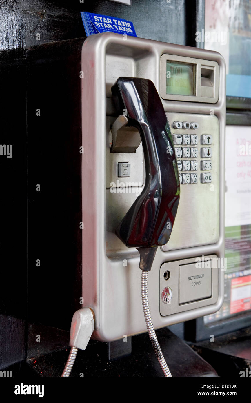 Bt public phone booth with advertising hi-res stock photography and ...