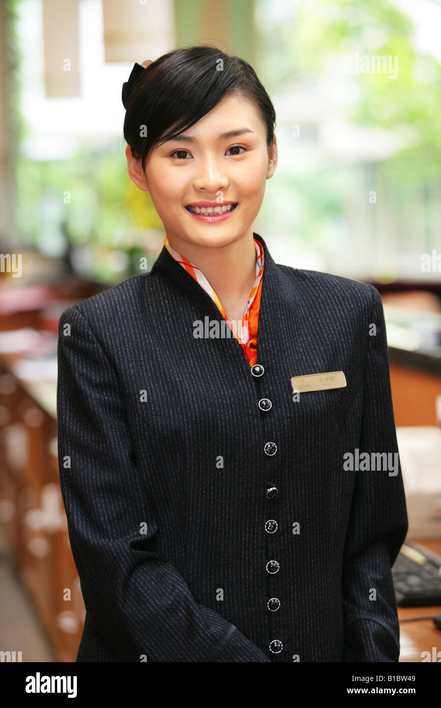 portrait of female receptionist Stock Photo - Alamy
