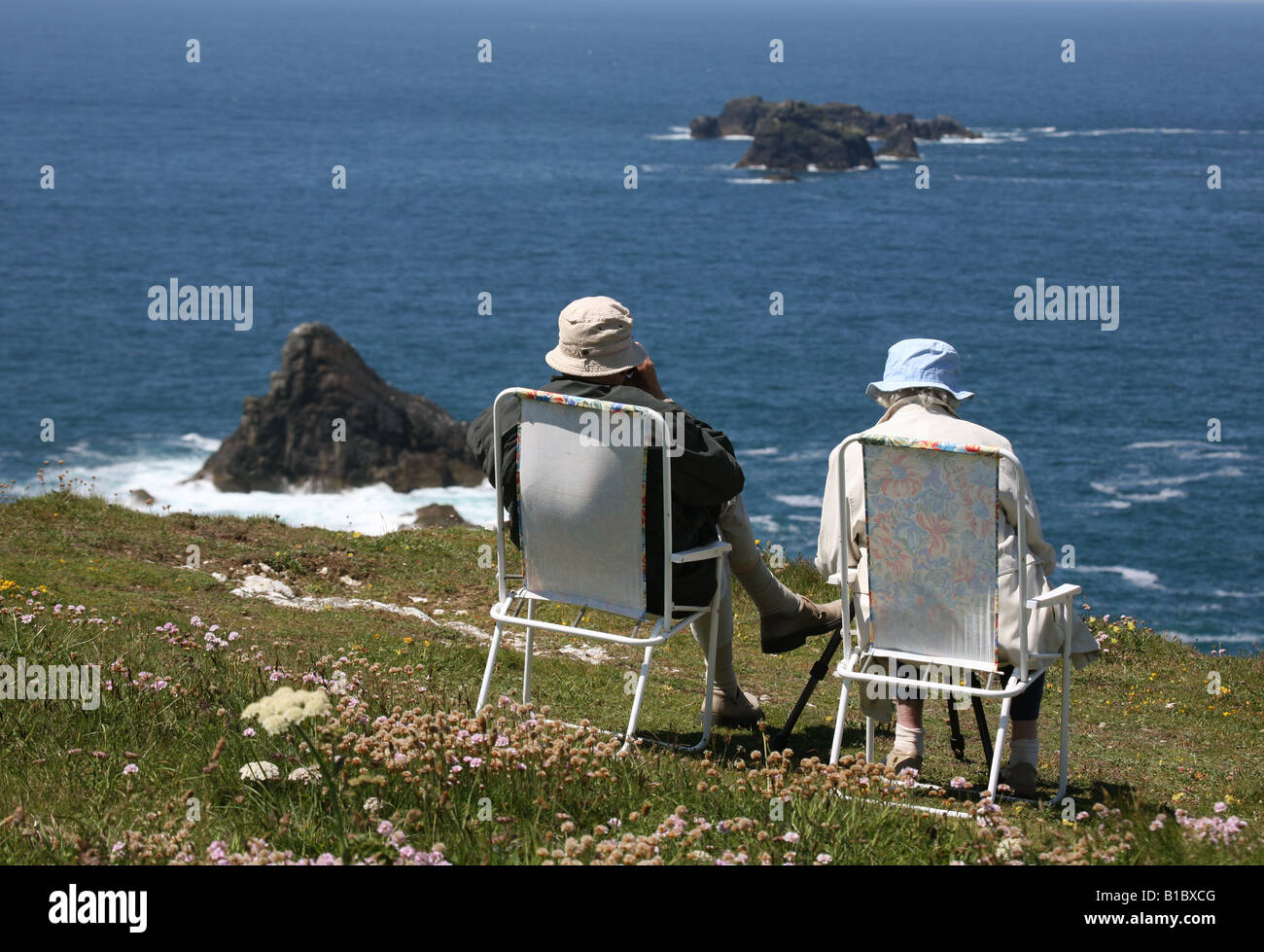 Couple enjoying the sea view Stock Photo - Alamy