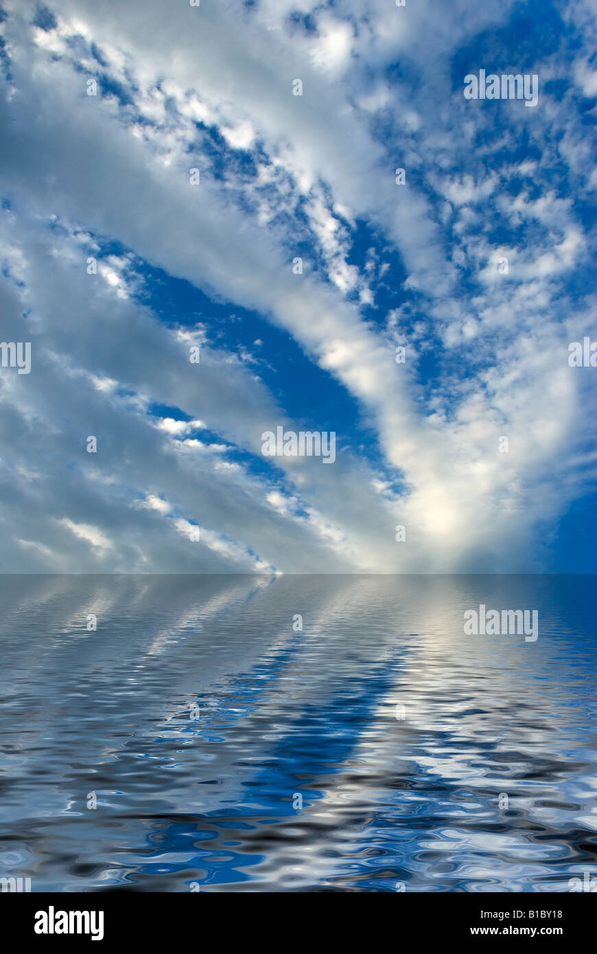 The cloudy sky above ocean with effect reflection Stock Photo - Alamy