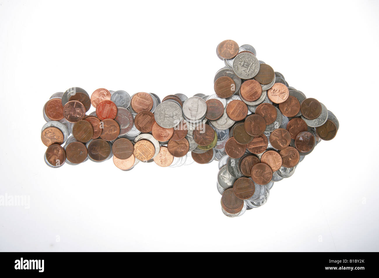 heap of US coins look like an arrow sign Stock Photo - Alamy