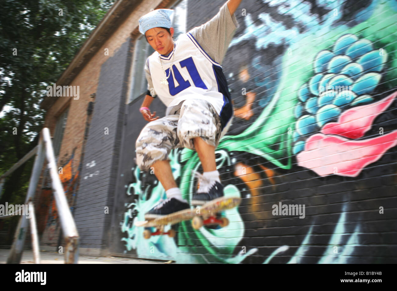 young man skateboarding at 798 Art Zone,Beijing,China Stock Photo - Alamy
