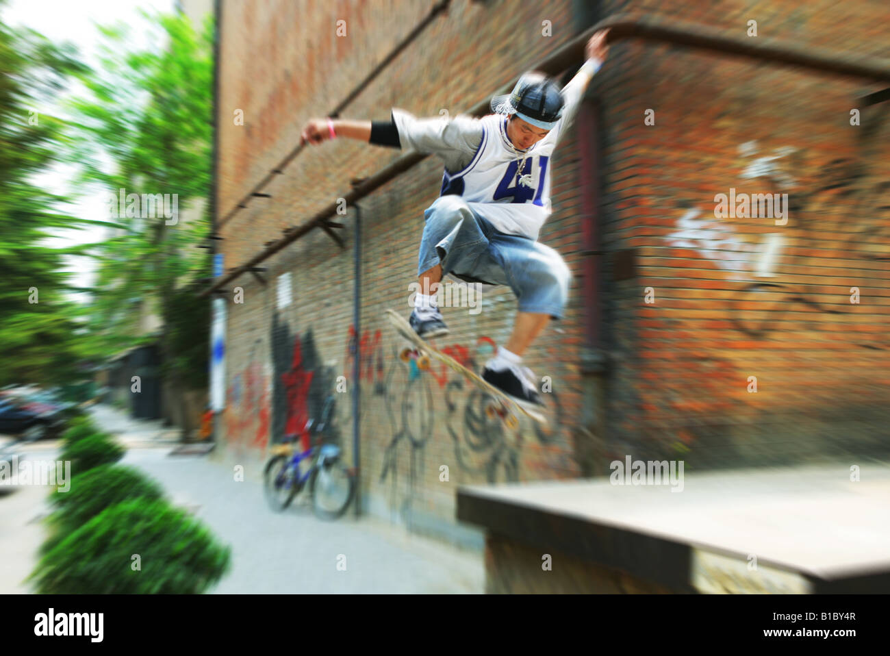 young man skateboarding at 798 Art Zone,Beijing,China Stock Photo - Alamy