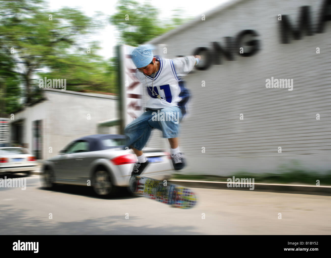 young man skateboarding at 798 Art Zone,Beijing,China Stock Photo - Alamy