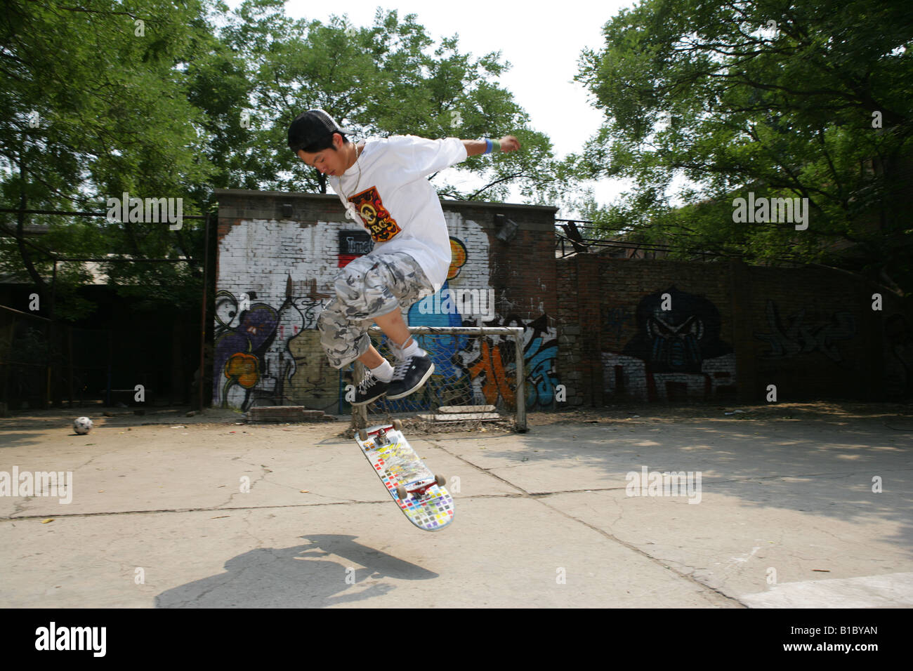 young man skateboarding at 798 Art Zone,Beijing,China Stock Photo - Alamy