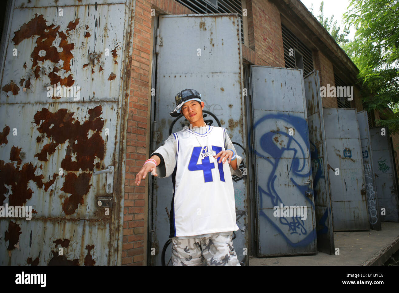 young man gesturing at 798 Art Zone,Beijing,China Stock Photo - Alamy