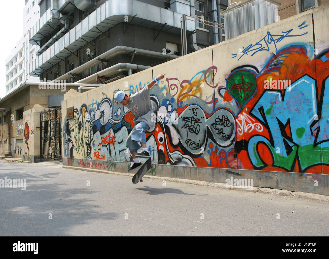 young man skateboarding at 798 Art Zone,Beijing,China Stock Photo - Alamy