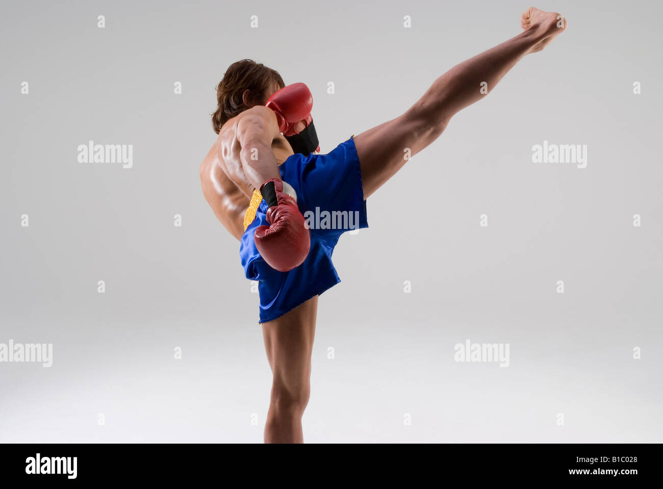 Kicking man hi-res stock photography and images - Alamy