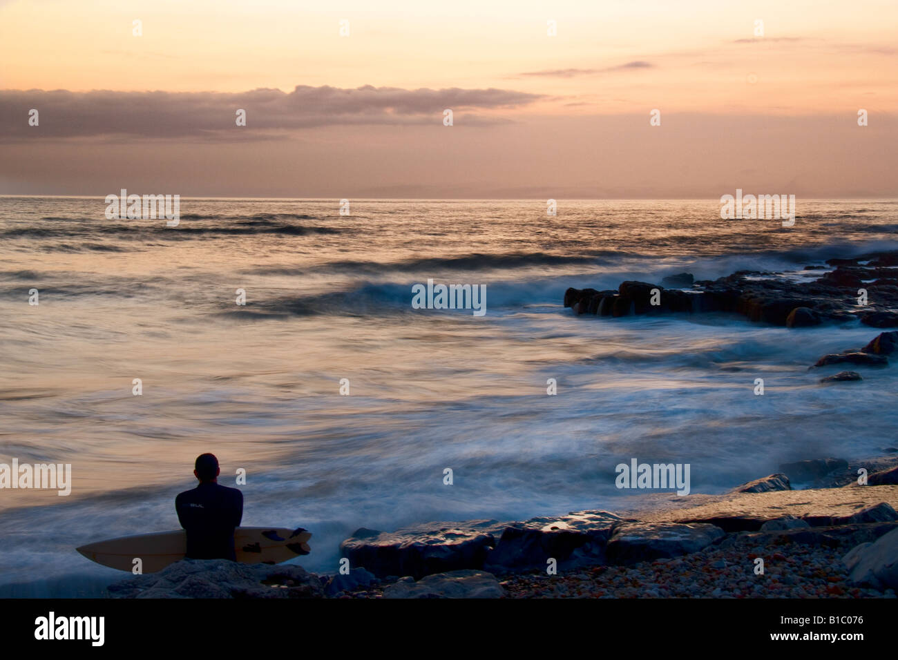 Surfer at Rest Bay Porthcawl Stock Photo - Alamy