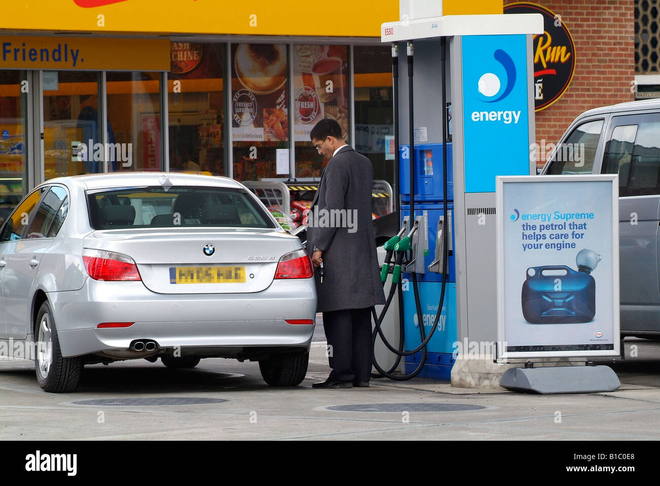 Filling car with petrol hi-res stock photography and images - Alamy