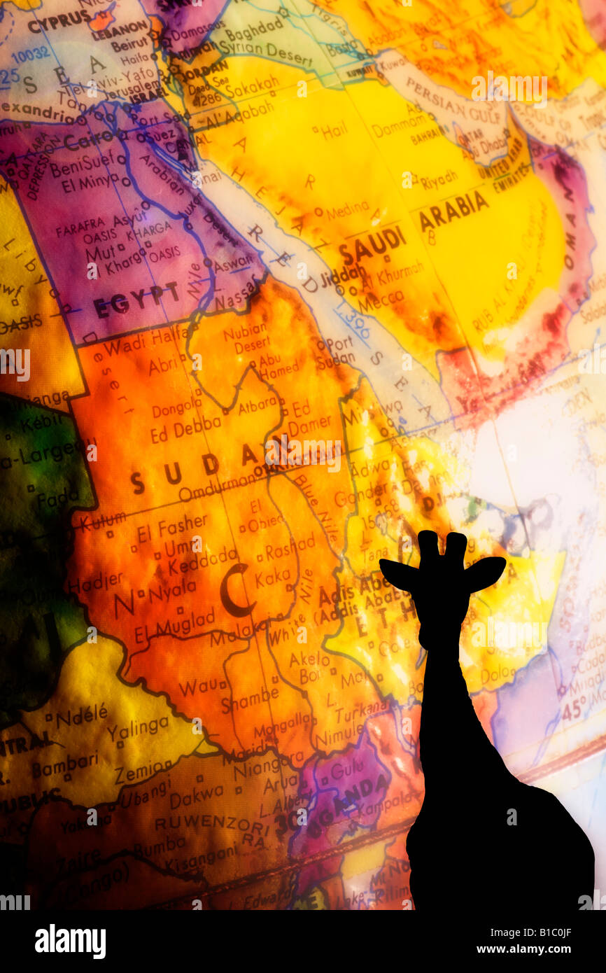 Giraffe silhouette with map background Stock Photo - Alamy