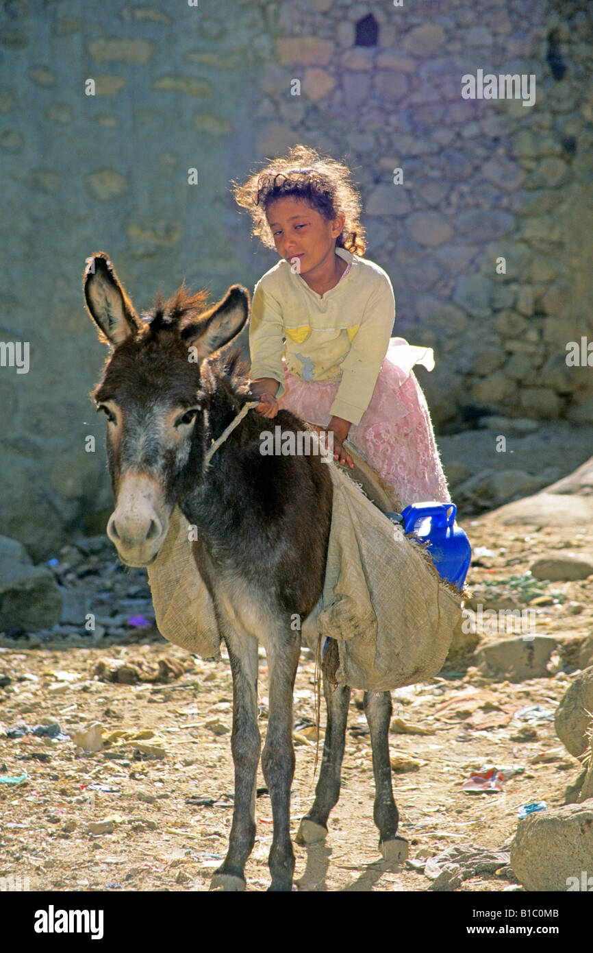 Girl on donkey hi-res stock photography and images - Alamy