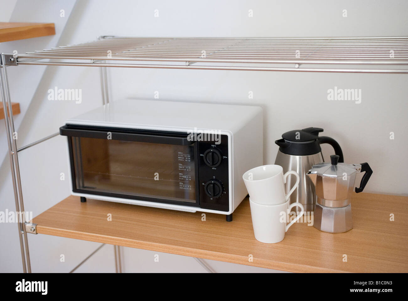 Toaster and cups Stock Photo - Alamy
