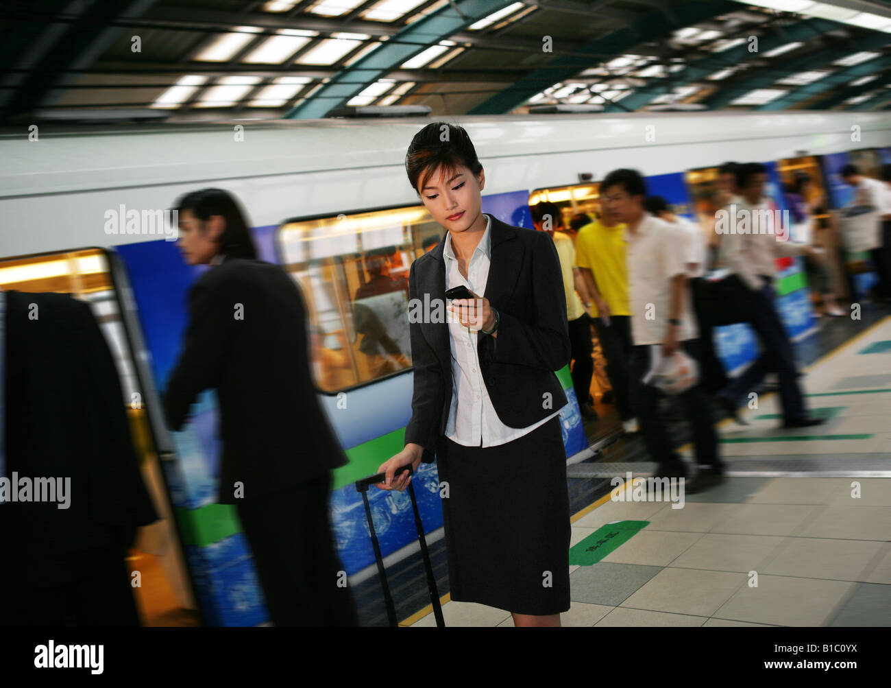 one businessman, one businesswoman and others boarding or disembarking ...
