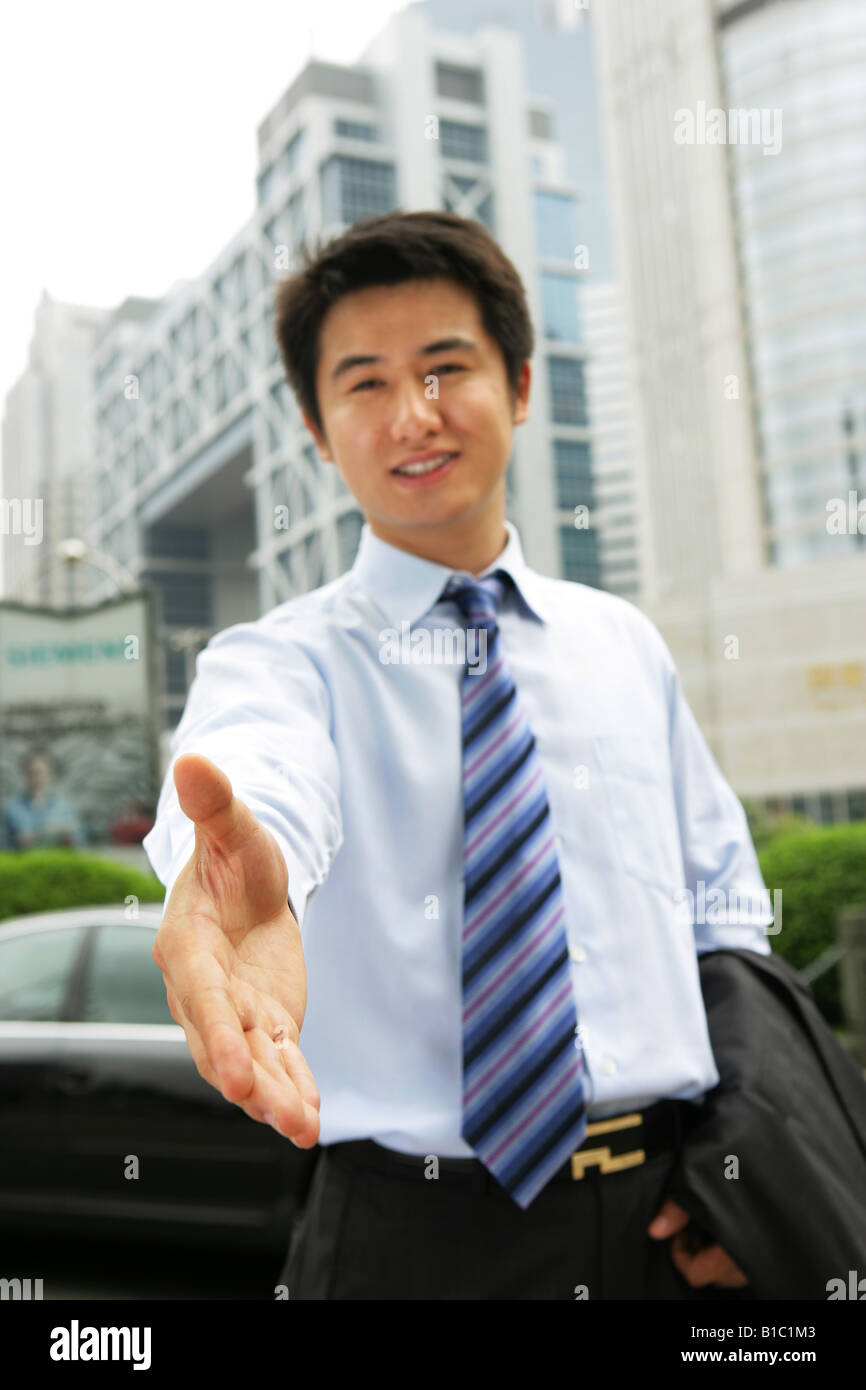 one businessman reaching his hand with passion,Shanghai,China Stock ...