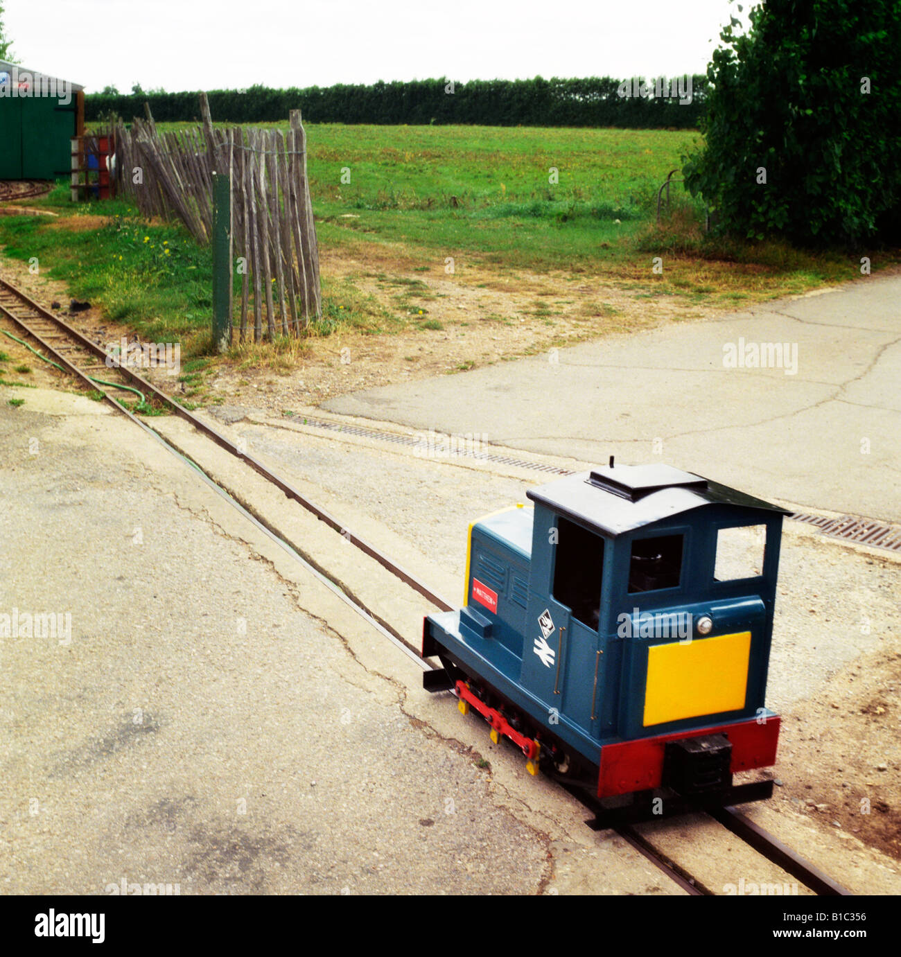 a miniature train on track Stock Photo - Alamy