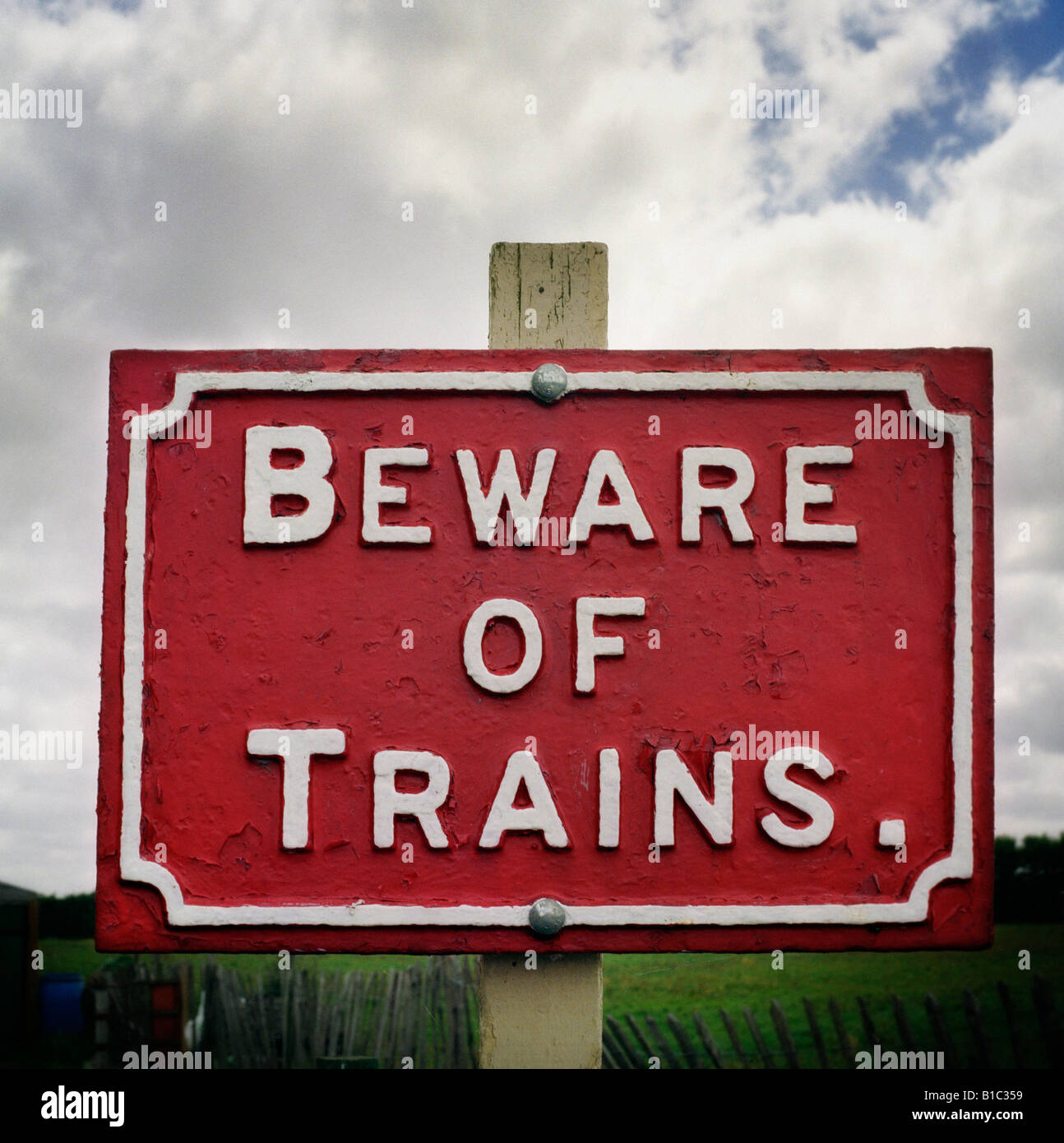 beware of trains sign Stock Photo - Alamy