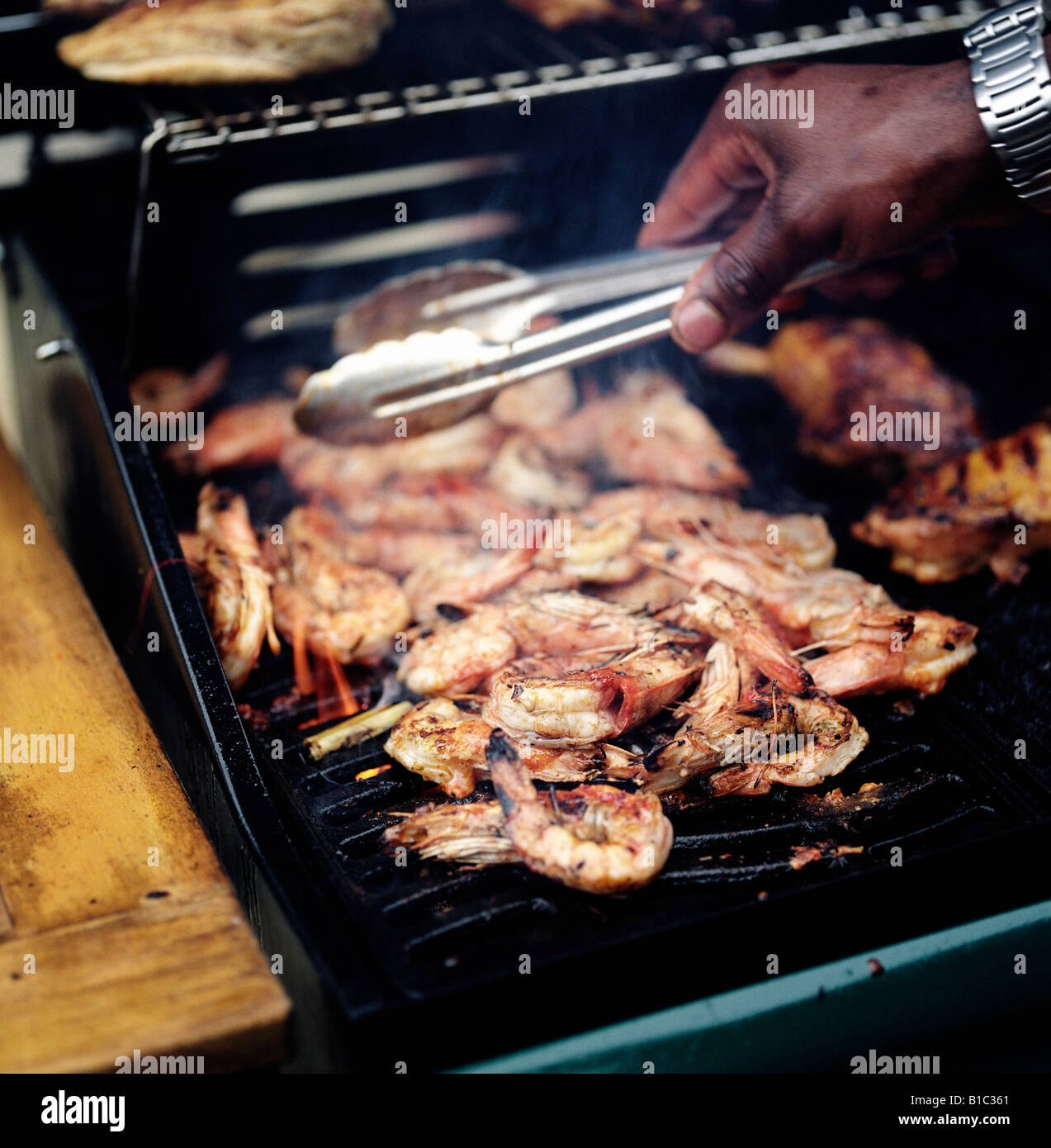 prawns cooking on a barbeque Stock Photo - Alamy