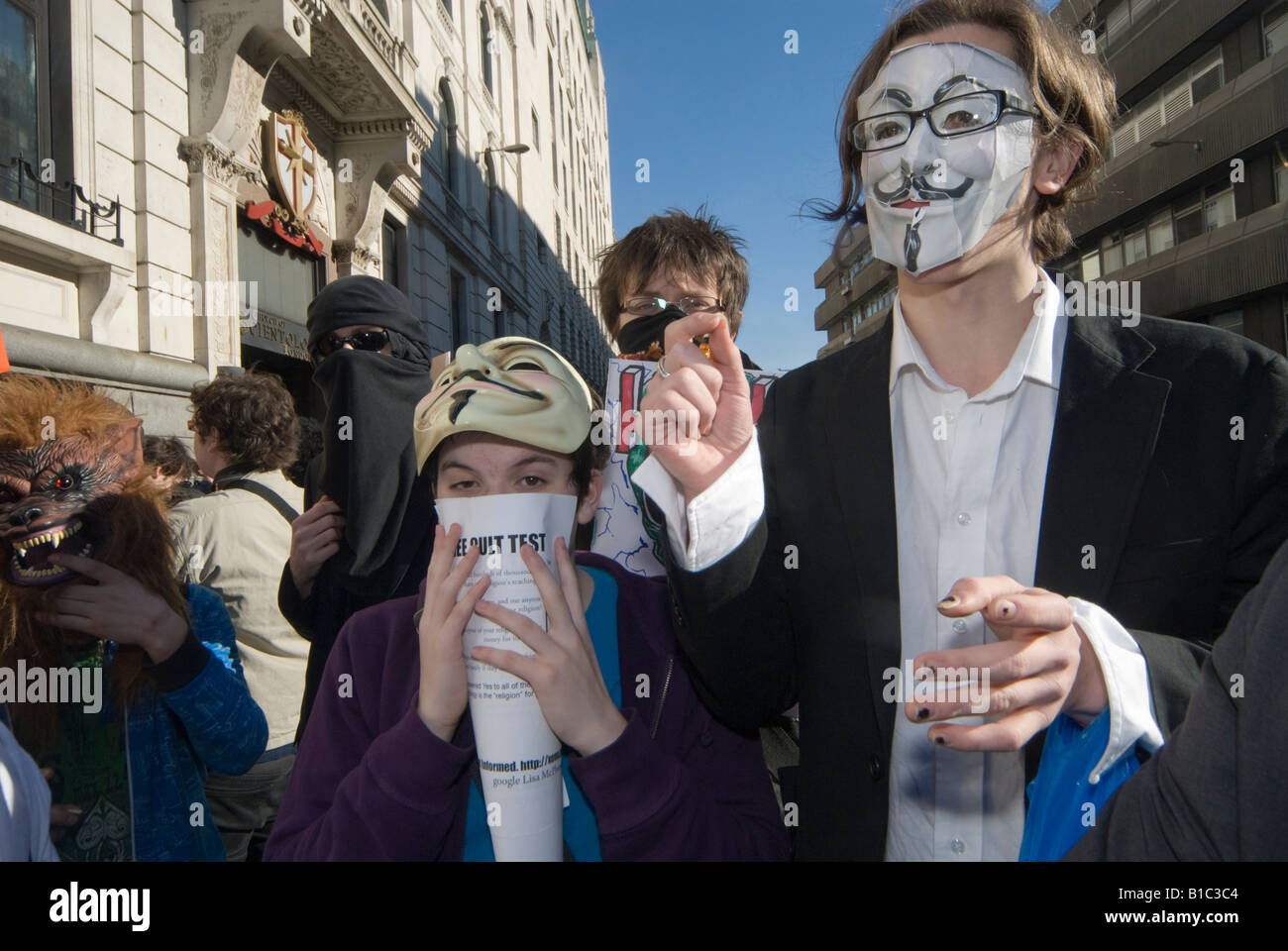 'Anonymous' protest at Church of Scientology - people with masks on the ...