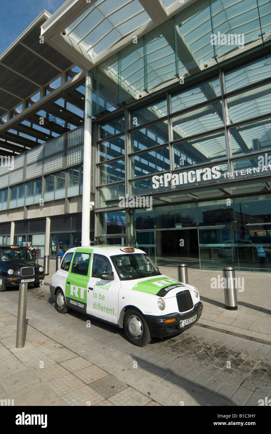 Taxis queue at the taxi rank outside St Pancras International station in the city of London ...