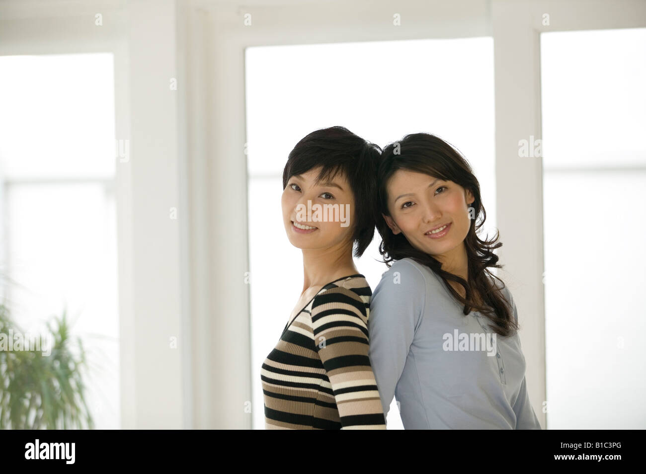Portrait of two women Stock Photo - Alamy
