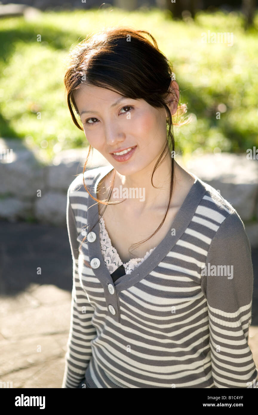 Portrait of mid adult woman smiling Stock Photo - Alamy