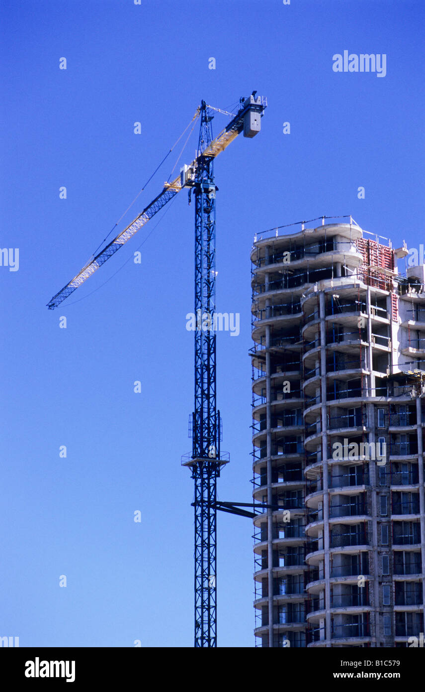 Construction site, apartment building project, crane, blue sky, housing ...